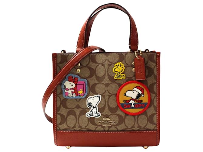 Coach Dempsey Brown Cloth ref.1189938 - Joli Closet