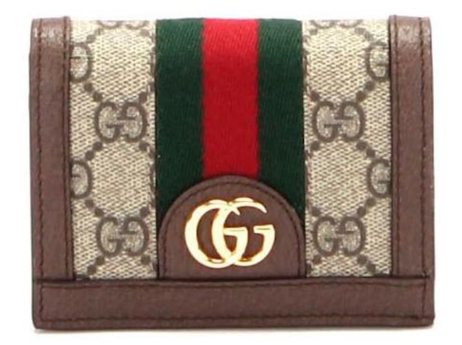 Gucci Cartera Gg de lona con dos pliegues unisex 523155 en beige Lienzo ...