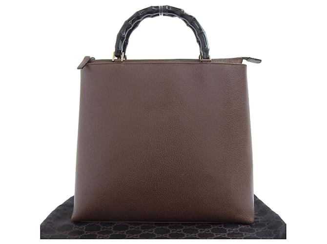 Gucci Sacs Porte-documents Cuirs exotiques Marron foncé ref.552525 ...