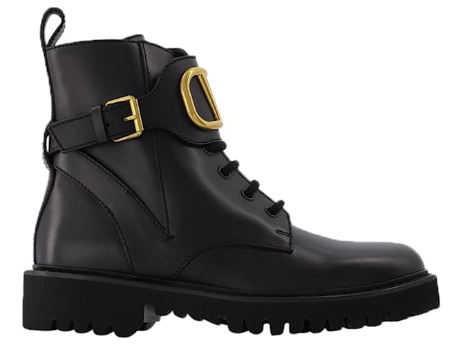 Valentino Garavani Bottes de combat Vlogo Signature en cuir noir ref ...