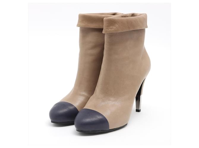 *Bottes en cuir Chanel Coco Mark 36 1/2C Beige pour femme ref.654708 ...