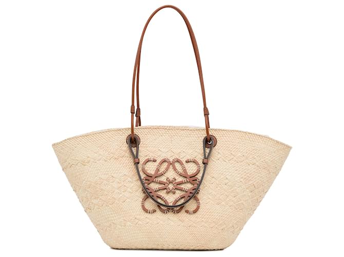 Bolso tote mediano de rafia con anagrama de Loewe Brown x Paula's Ibiza ...