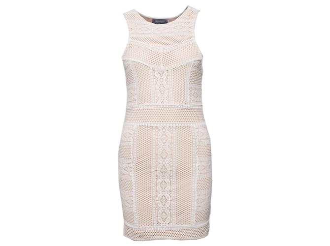 Magali Pascal, White perforated dress with a skin-colored slip dress in ...