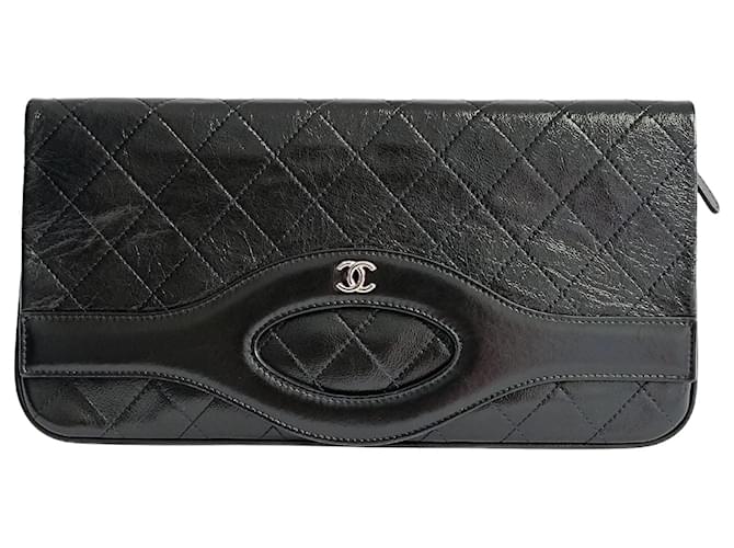 Chanel Chanel Clutch handbag in matelassé black leather ref.1295821 ...