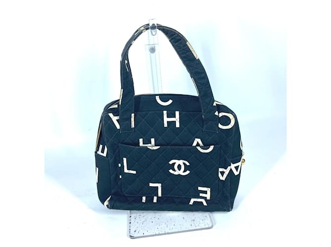 Chanel CC Handbag in Black Canvas White Cloth ref.1887015 - Joli Closet