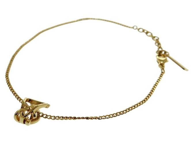 Yves Saint Laurent Opium Monogram Twist Cassandra Bracelet Golden ref ...