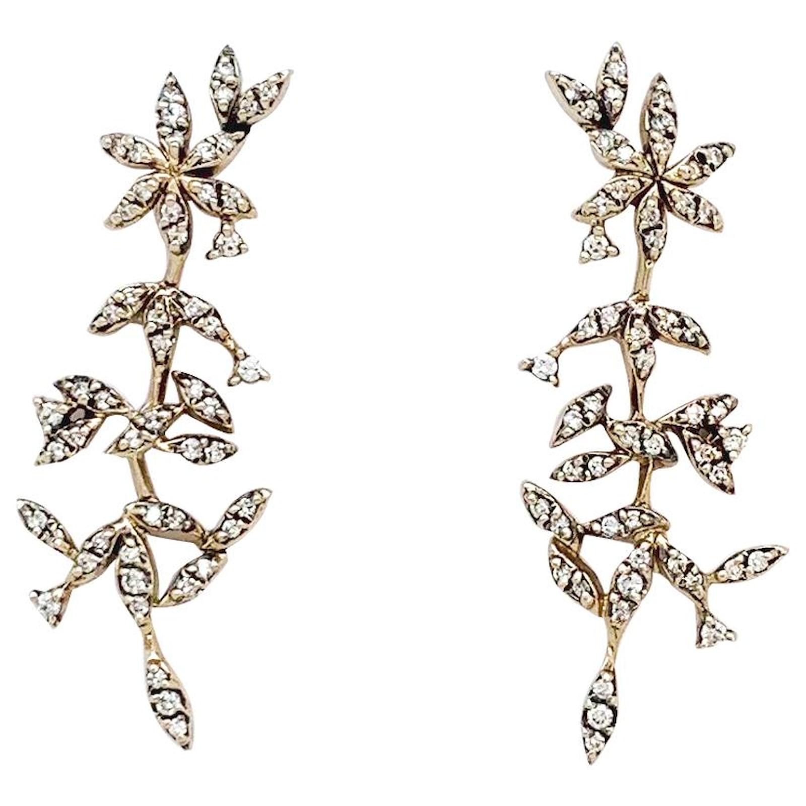 H Stern H earrings.Stern, "Nature", in gold and diamonds. White gold ...