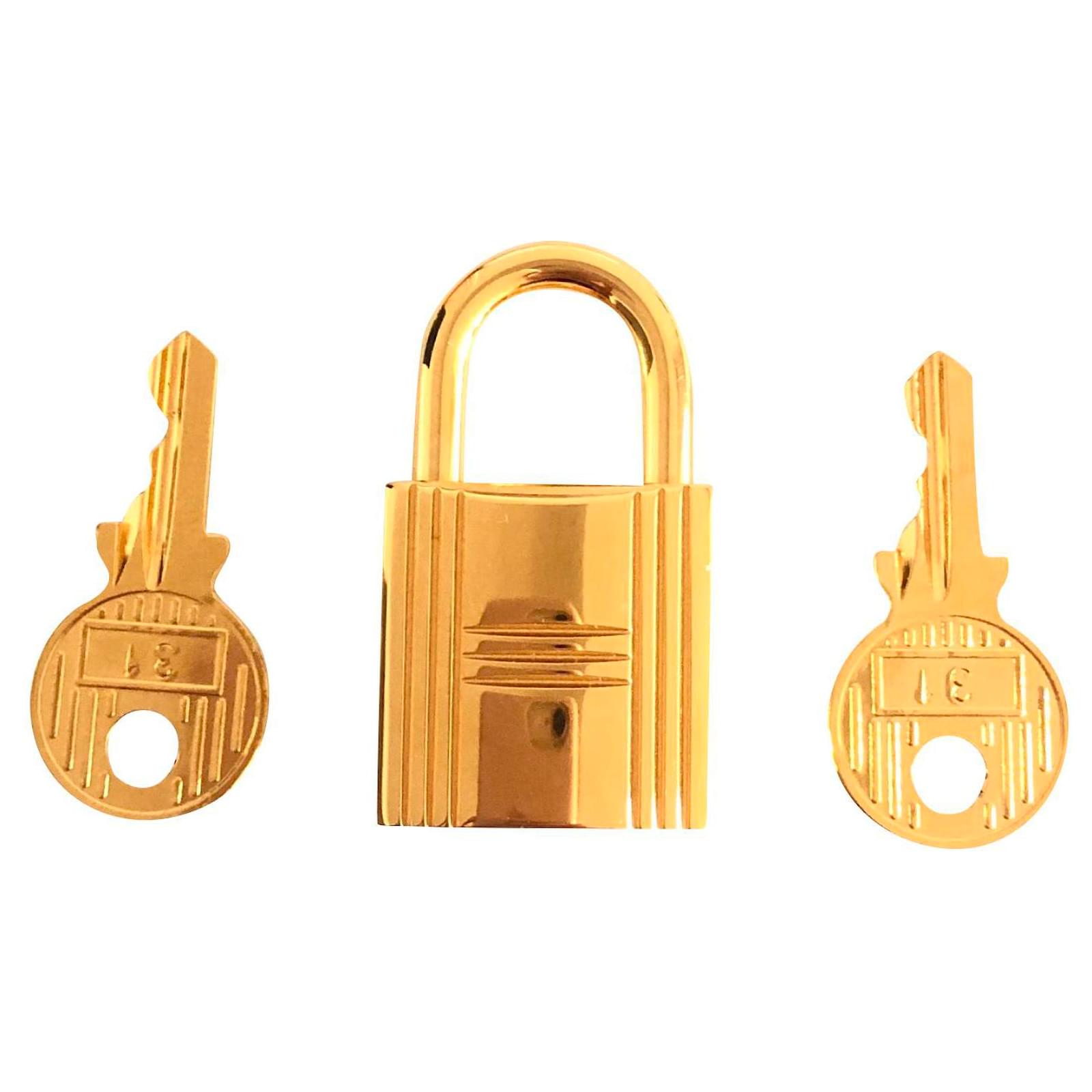Hermès Hermes padlocks Golden Metal ref.221316 - Joli Closet