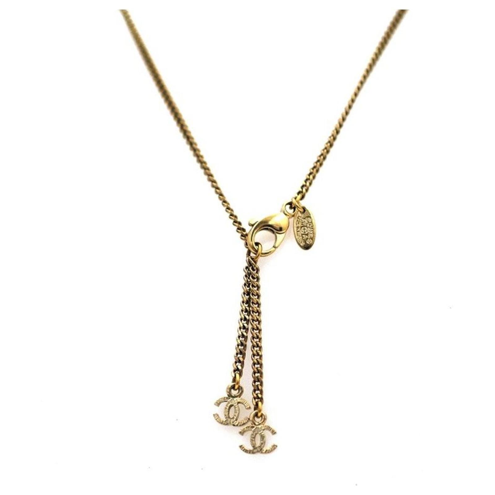 Collier Chanel Gold Coco Mark Swing Cube Matière Métal Doré ref.474410 ...