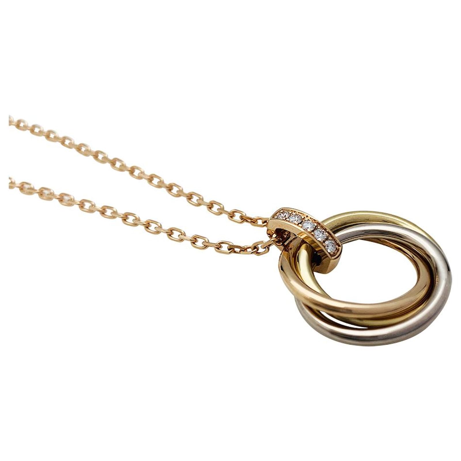Love Collier Cartier, "Trinity", trois ors, diamants. Or blanc Or jaune ...