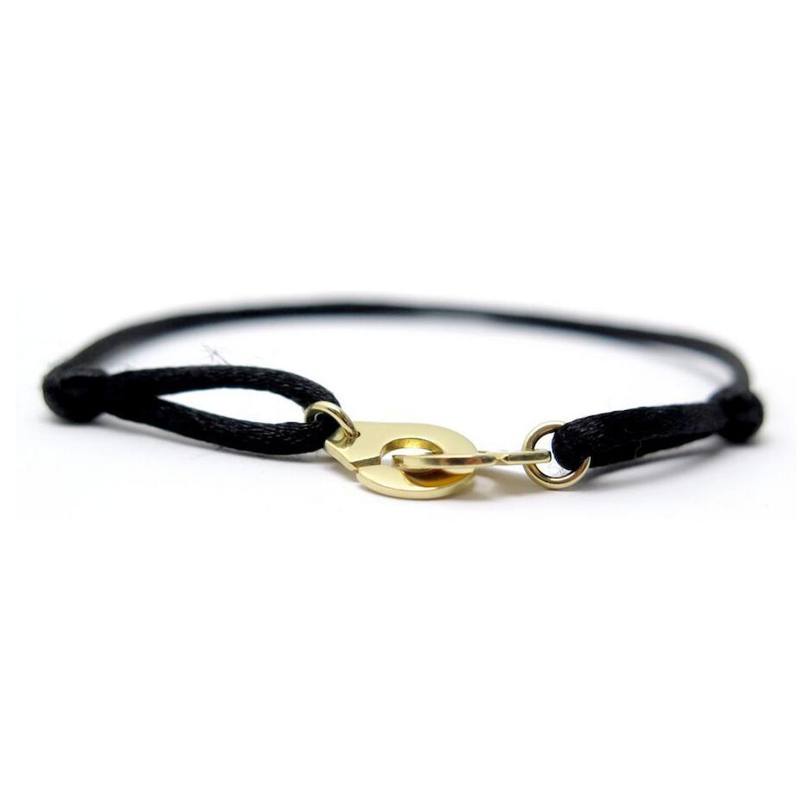 DINH VAN MENOTTES R BRACELET10 341102 In yellow gold 18K BLACK CORD ...