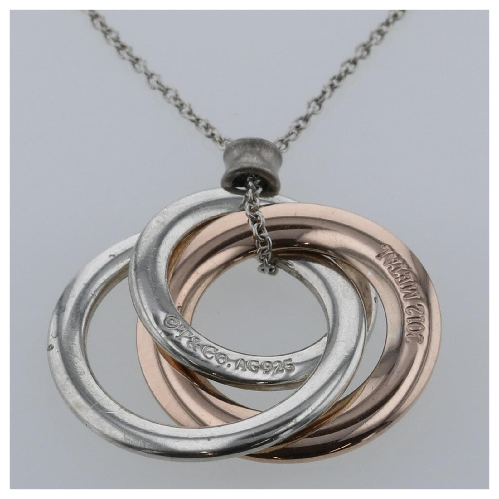 TIFFANY & CO. Interlocking Circles Golden Metal ref.756452 - Joli Closet