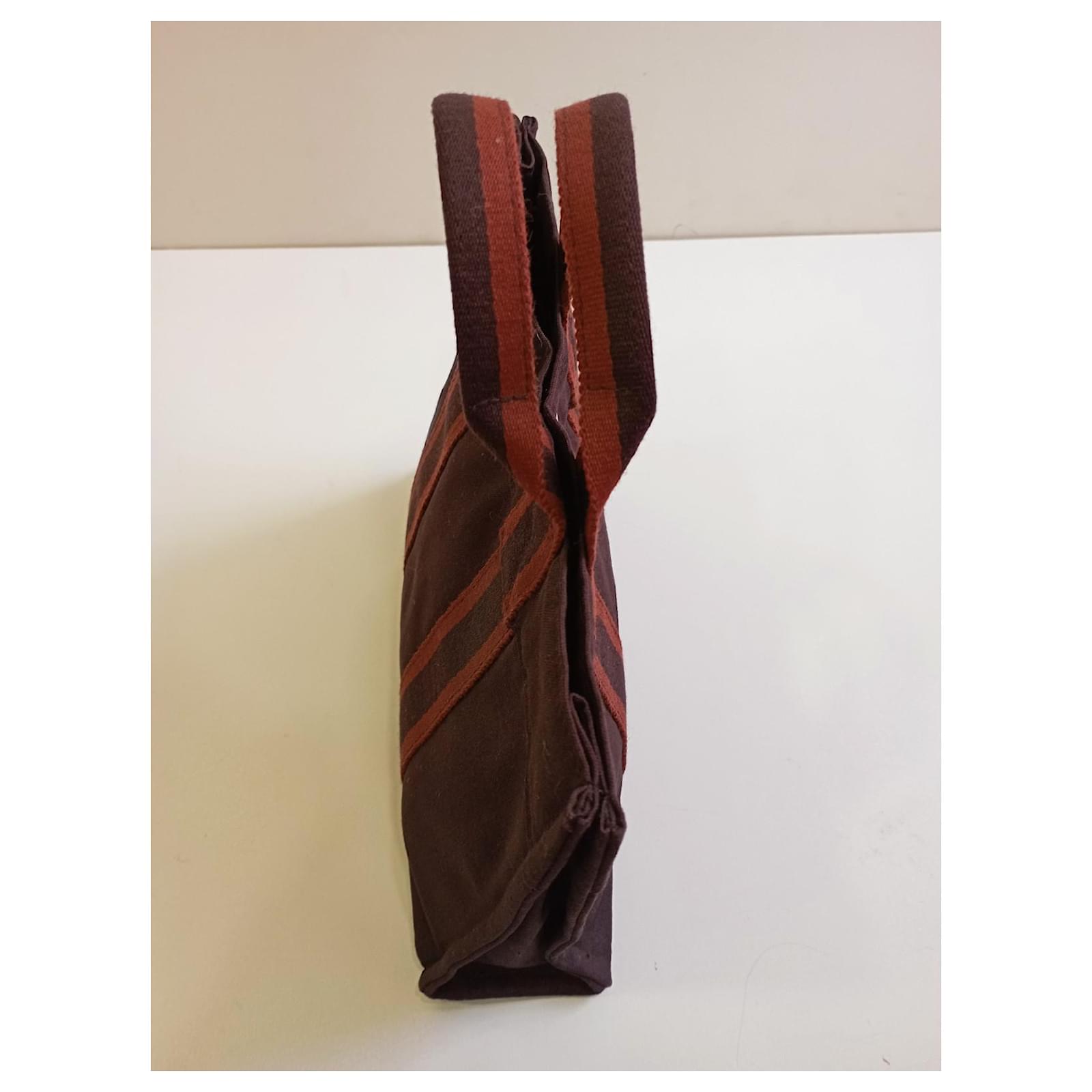 Toto Bag Hermès Handbags Dark red Cloth ref.817375 - Joli Closet