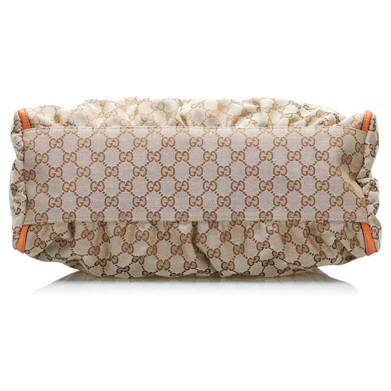 Gucci -- Orange Cloth ref.818886 - Joli Closet