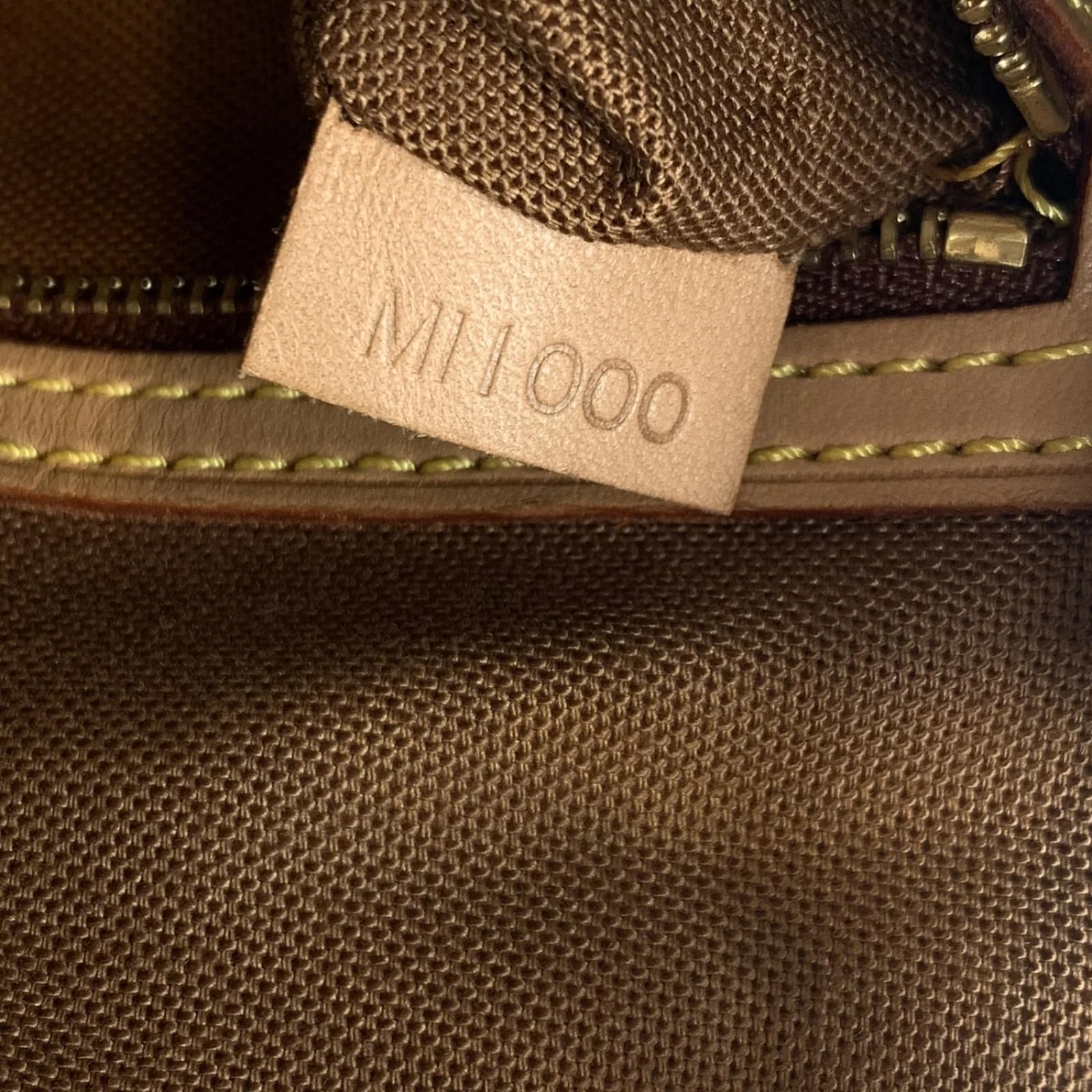 Looping Louis Vuitton Mini sac à boucle vintage en toile Monogram ...