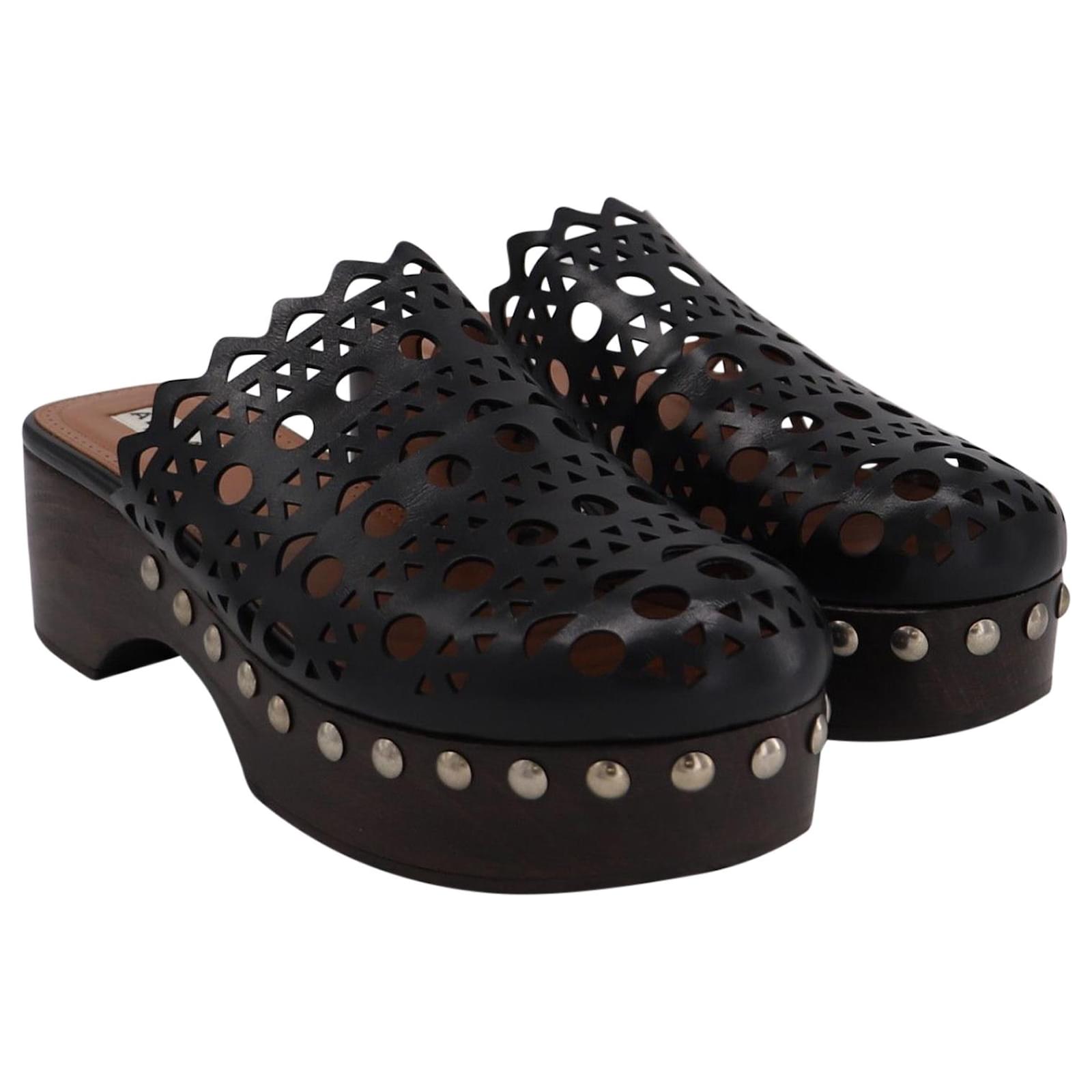 Alaïa Alaia Vienne Laser-Cut Studded Clogs in Black Leather ref.898693 ...