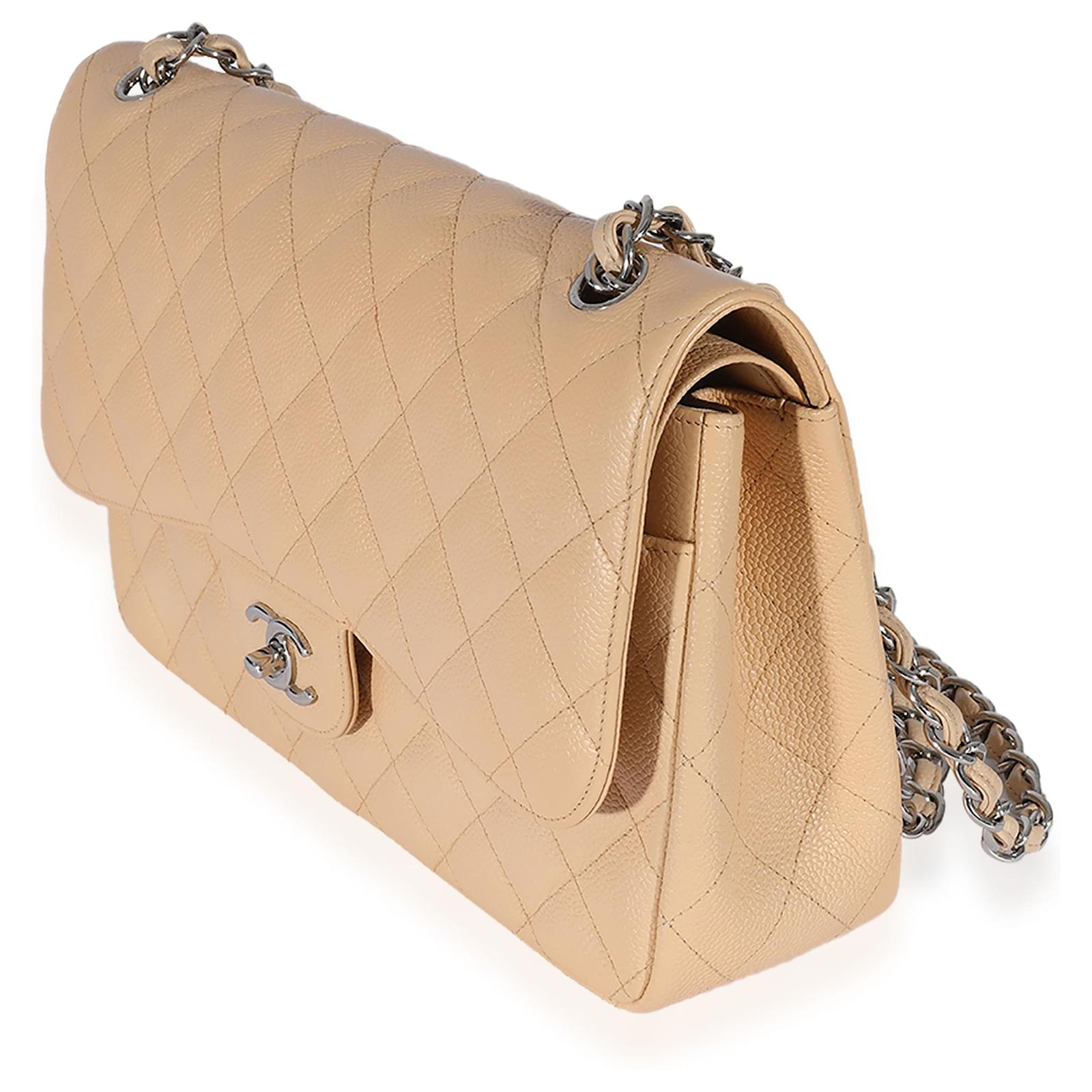 Timeless Chanel Beige Quilted Caviar Jumbo Classic Double Flap Bag ...