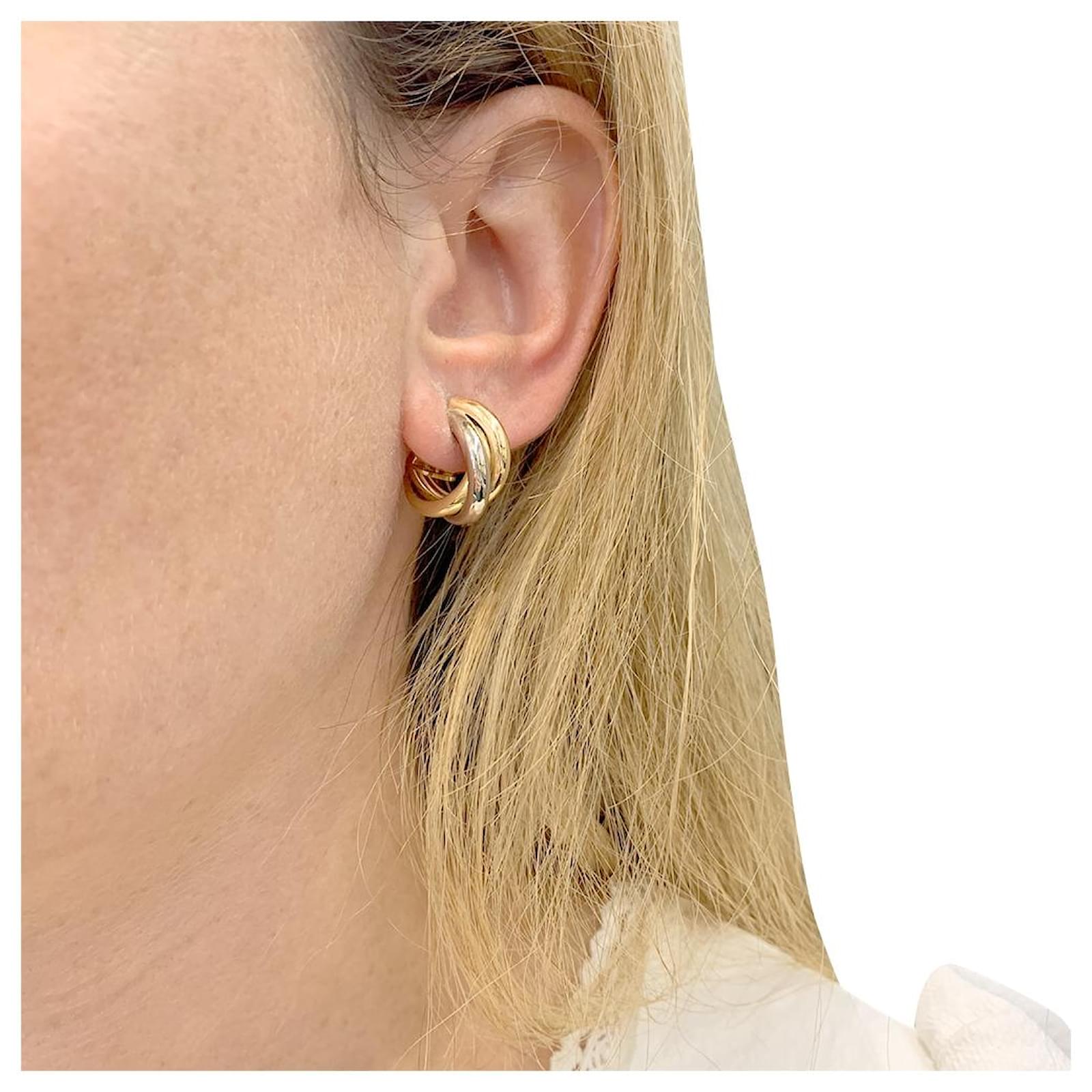 Cartier hoops, "Trinity", three golds. White gold Yellow gold Pink gold ...