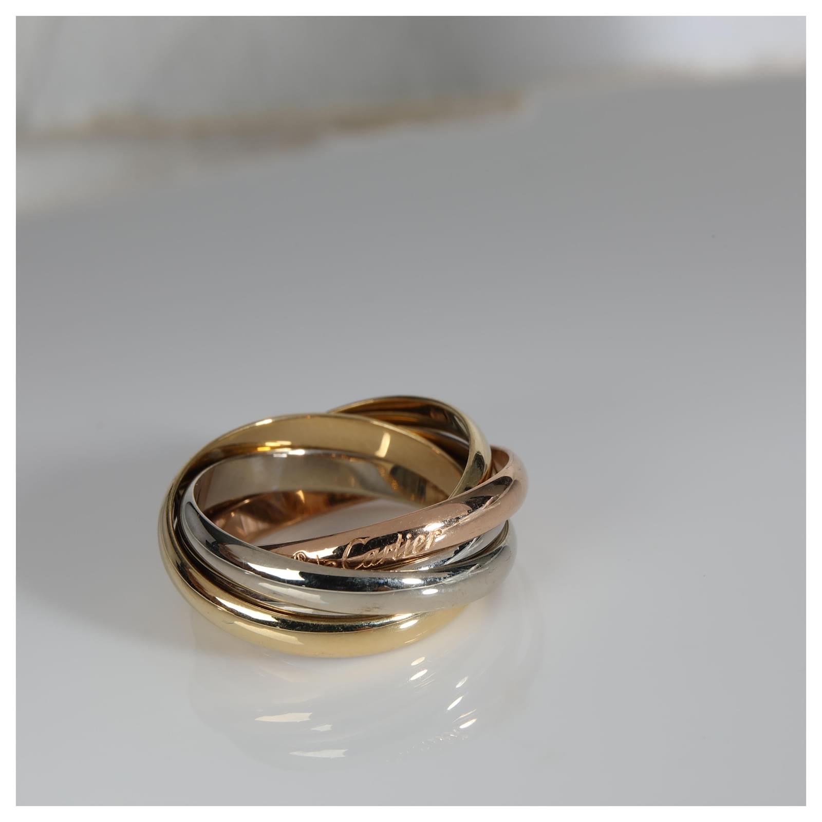 Trinity Cartier Bague roulante cinq bandes Les Must de Cartier en 18K 3 ...
