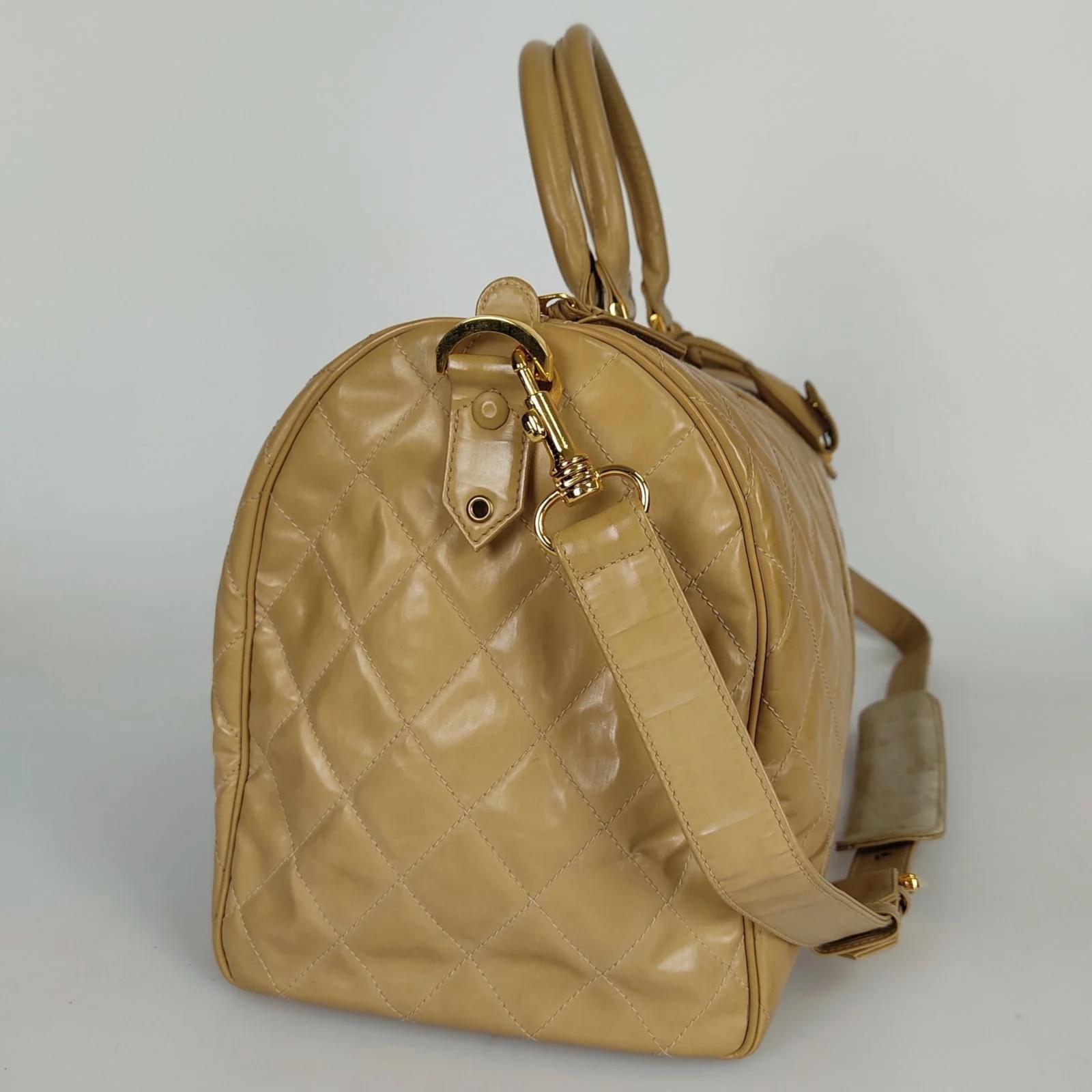 Chanel Chanel quilted travel bag in beige patent leather ref.990766 ...