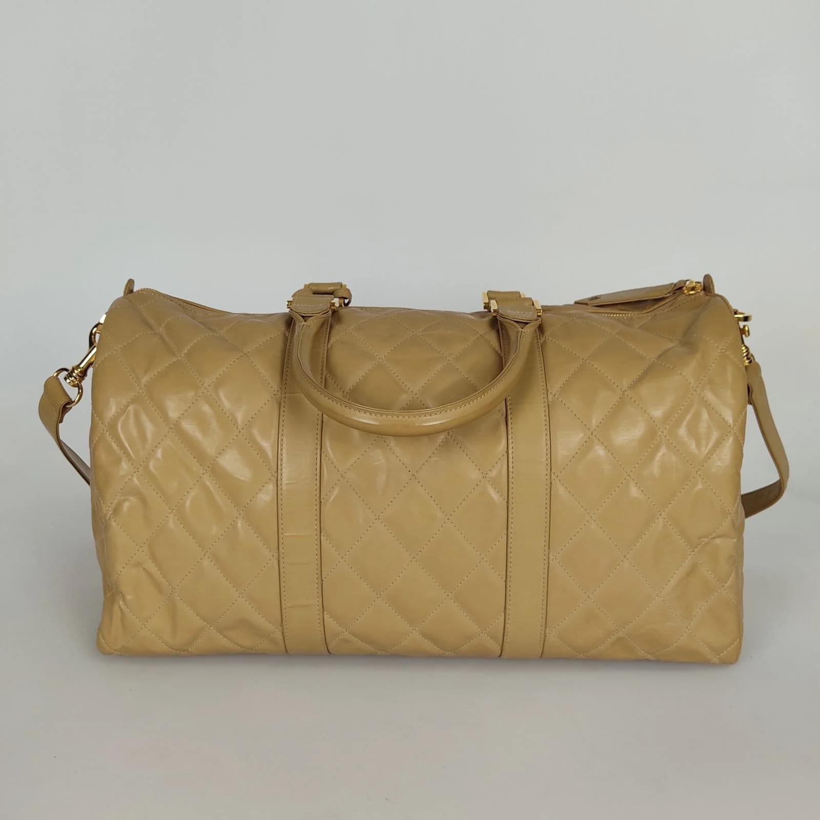 Chanel Chanel quilted travel bag in beige patent leather ref.990766 ...