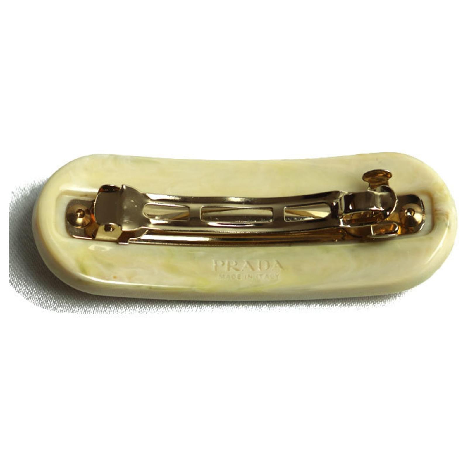 Prada Resin and Gold Plated Barrette Cream Gold-plated ref.1881142 ...