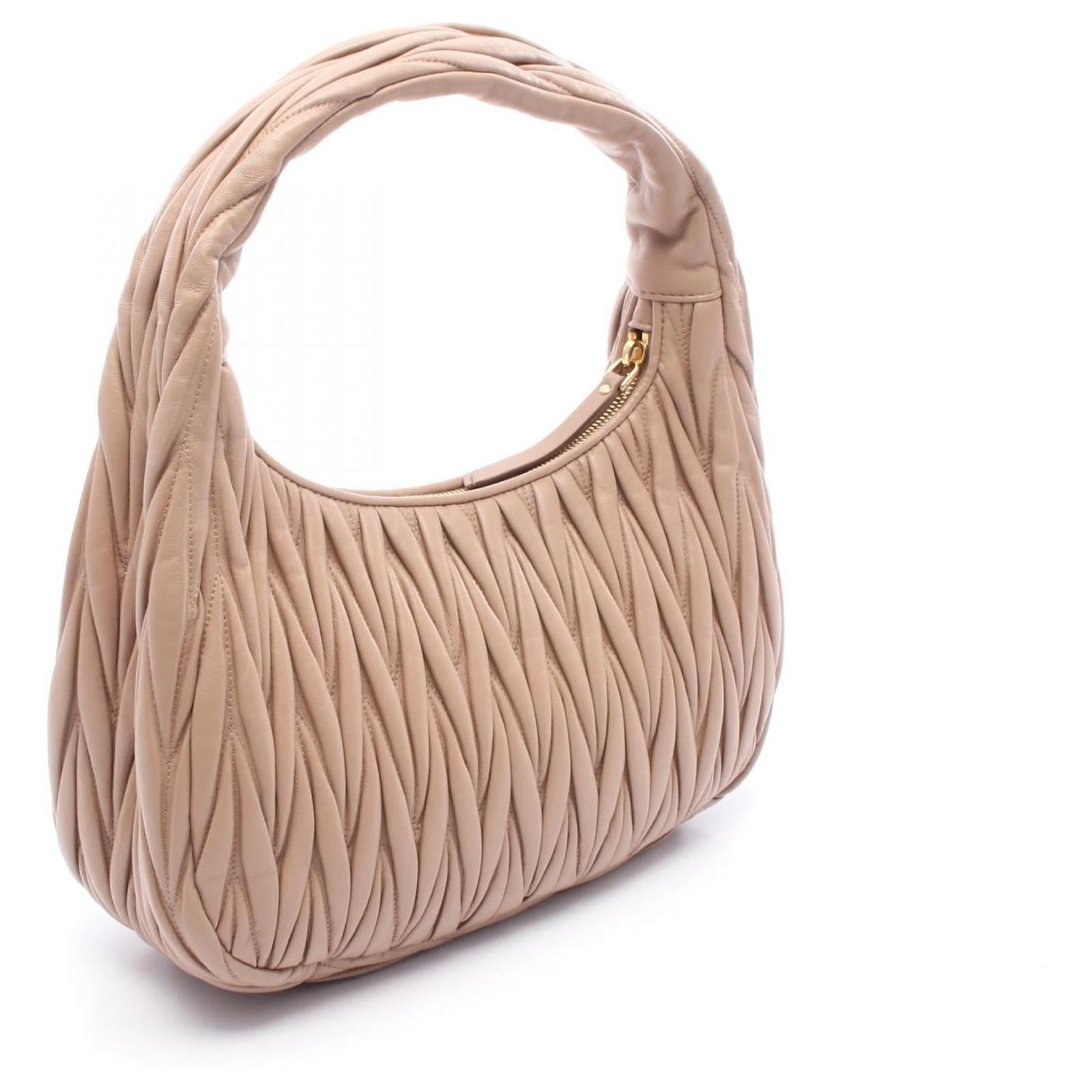 Miu Miu Leather Matelassé Hobo Bag Pink Pony-style calfskin ref.2508456 - Joli Closet