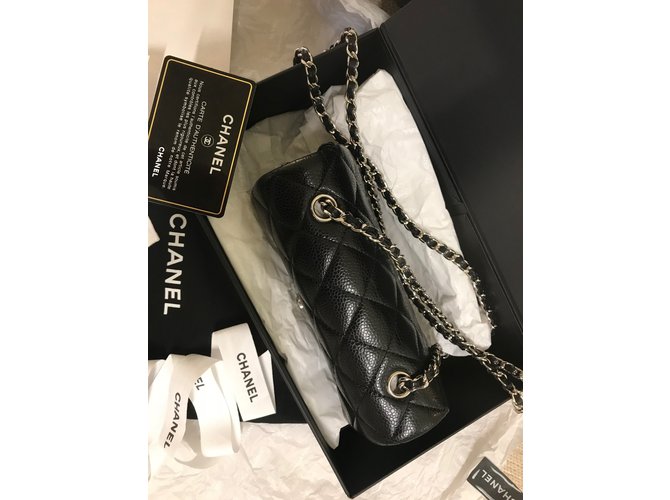 Timeless Chanel extra mini classic flap bag in black caviar leather ...