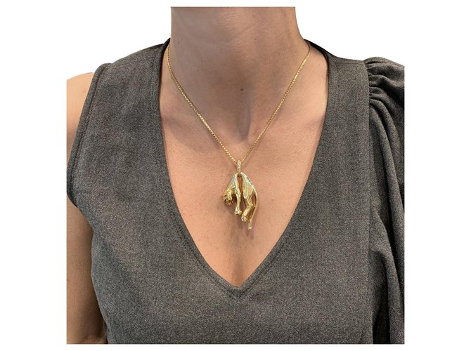 Pendentif Cartier "Panthère molle" or jaune, diamants. Or blanc ref ...