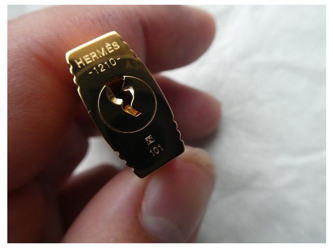 Hermès golden steel padlock with 2 keys ref.260874 - Joli Closet