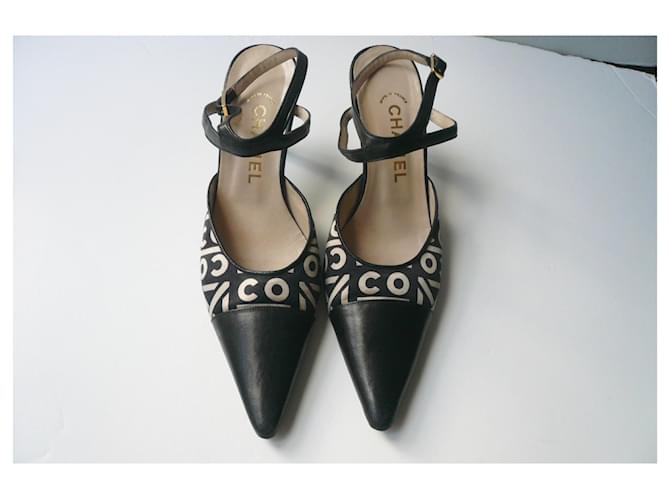 CHANEL Bi-material pumps in leather and Coco T monogram fabric37,5 IT ...