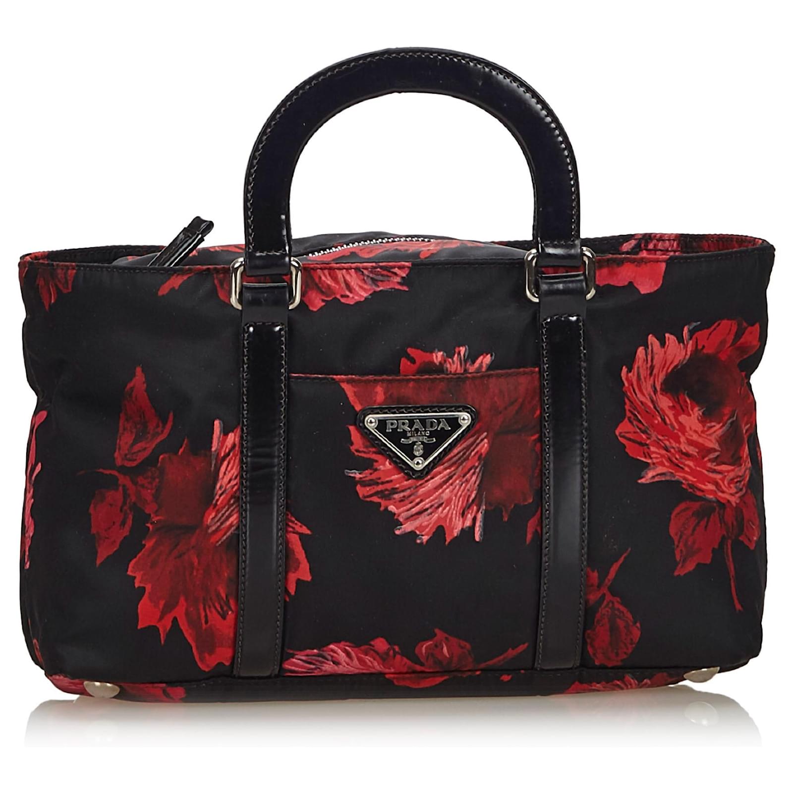 Sac à main en nylon imprimé noir Prada Cuir Tissu Rouge ref.137751 ...