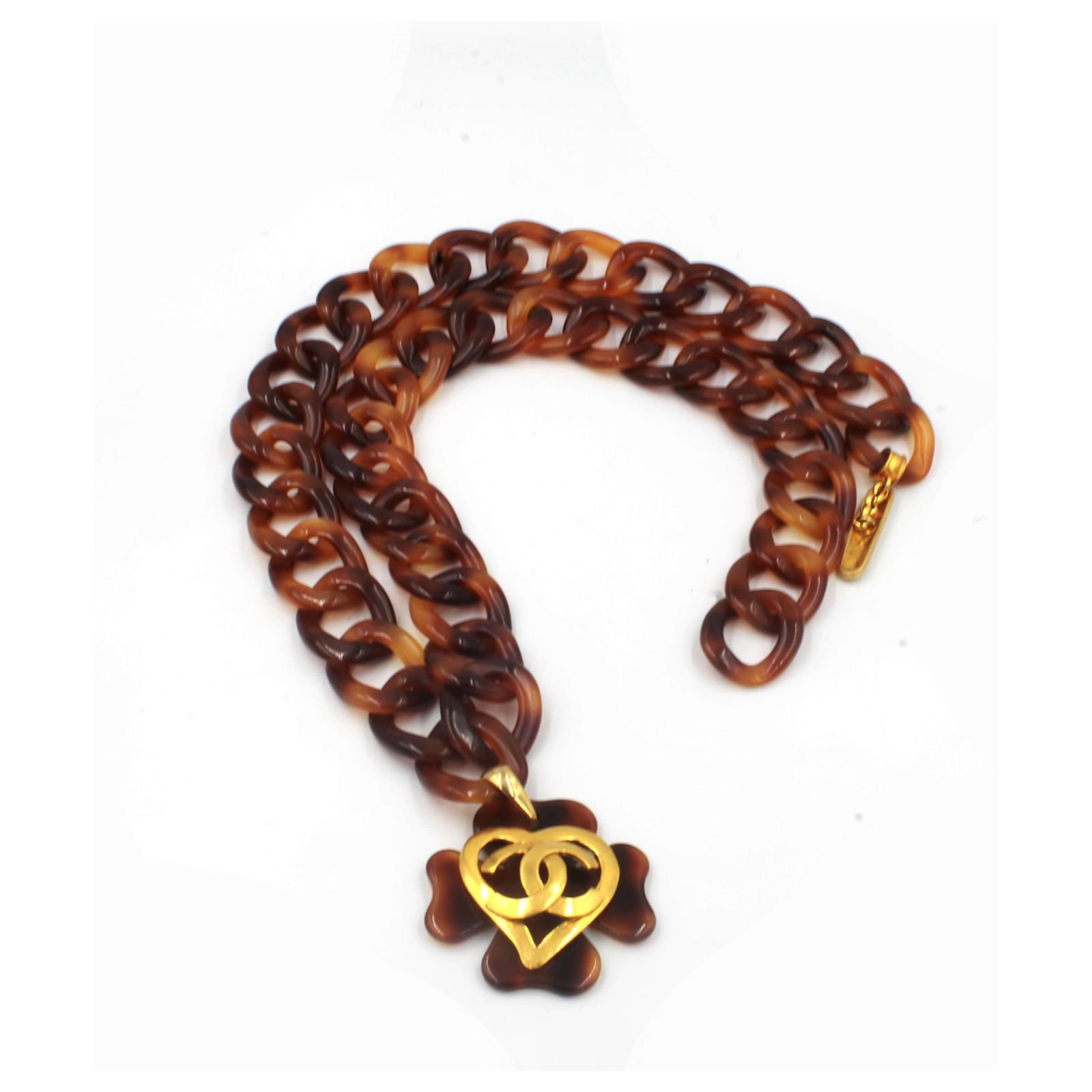 Chanel Bakelite Turtle shell Plastique Marron clair ref.203879 - Joli ...
