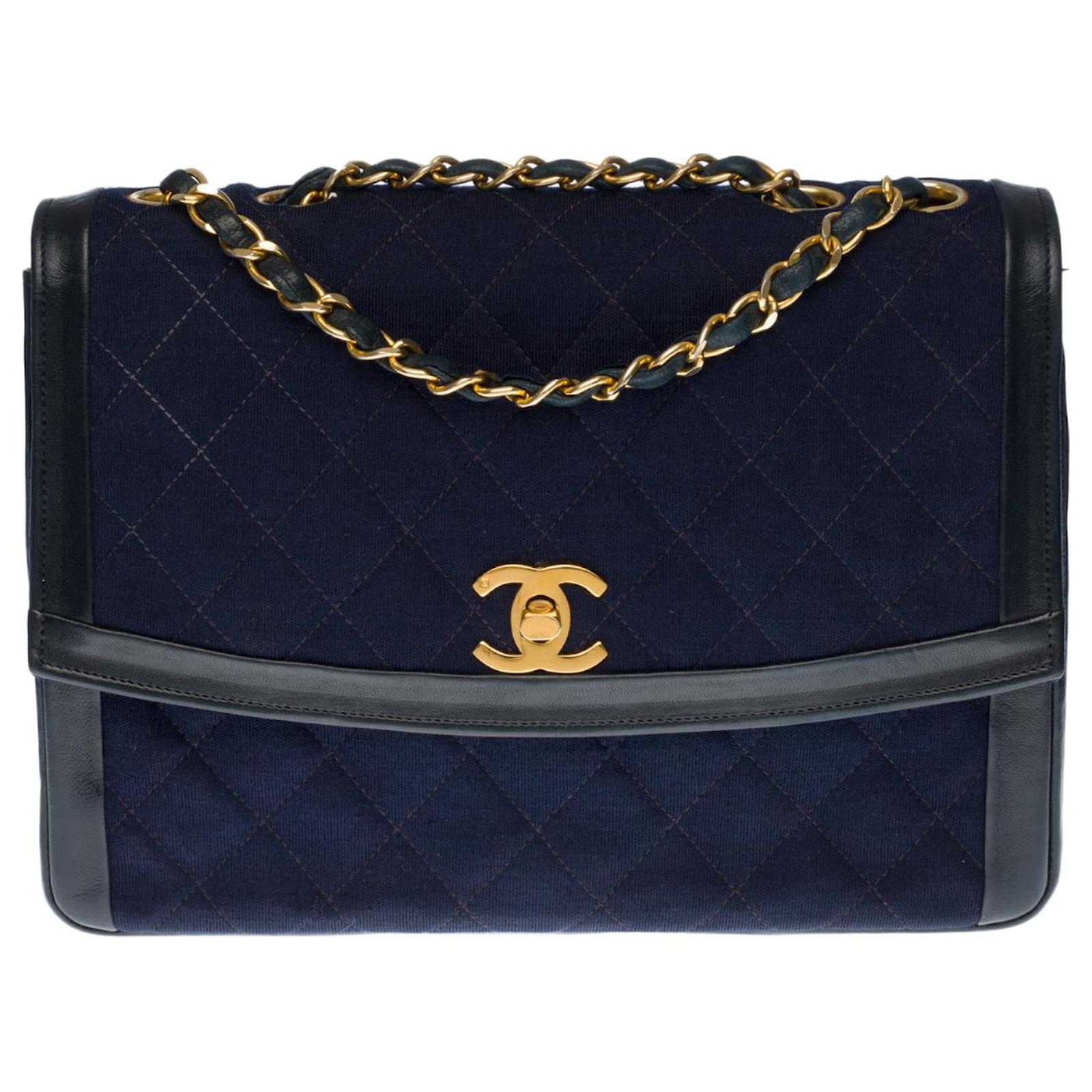 Lovely Chanel Classique bi-material bag in navy blue jersey and quilted ...