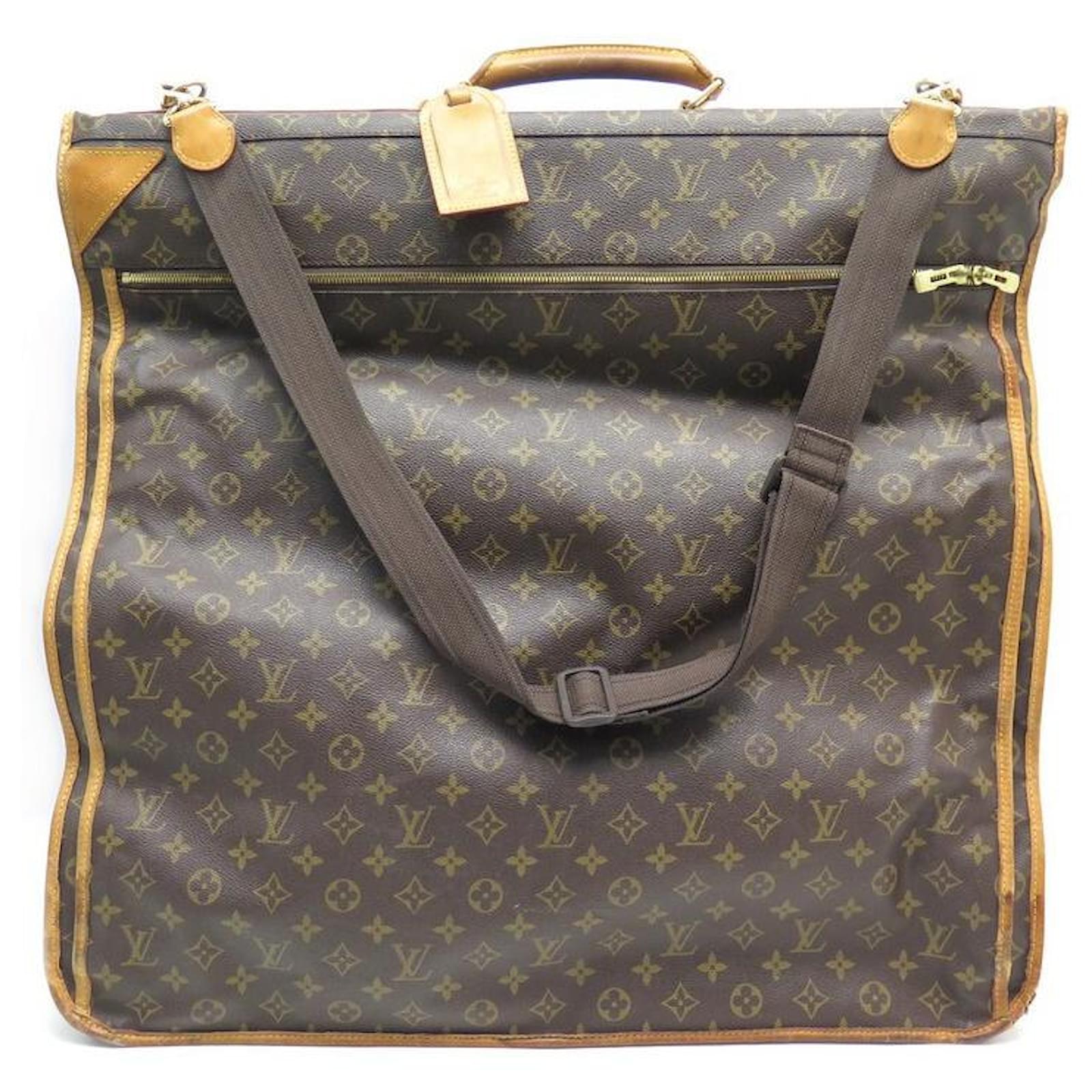 VINTAGE PORTE COSTUMES VETEMENTS LOUIS VUITTON EN TOILE MONOGRAM LV ...