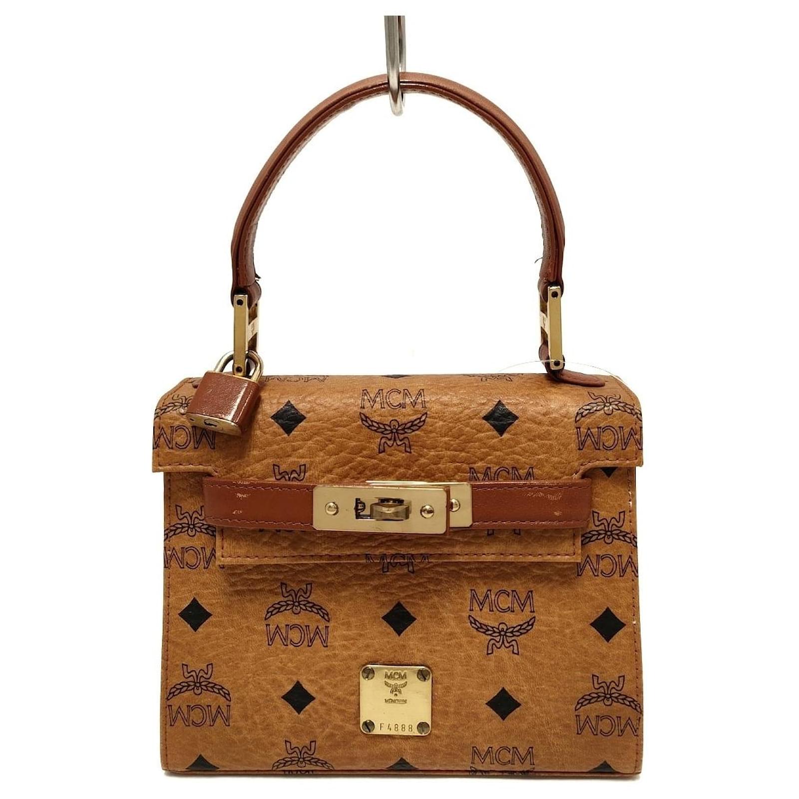 MCM Handbag Brown Synthetic ref.521472 - Joli Closet