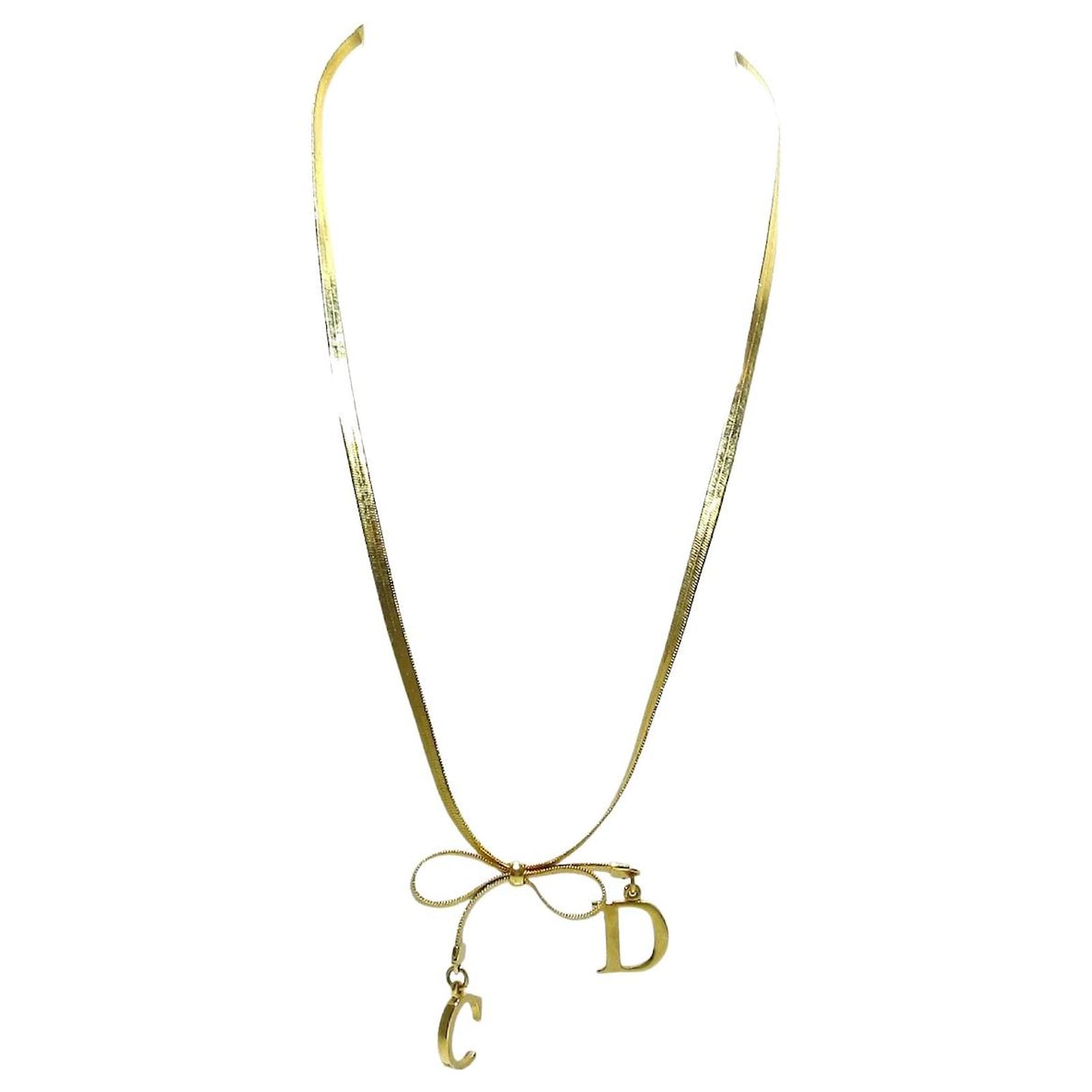 Dior logo Golden Metal ref.558649 - Joli Closet