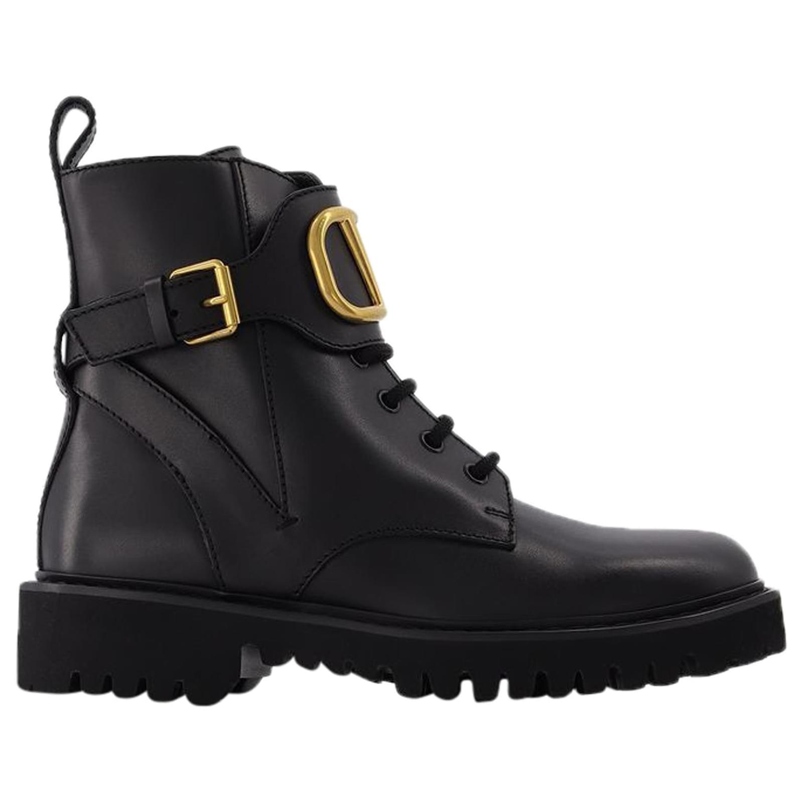 Valentino Garavani Bottes de combat Vlogo Signature en cuir noir ref ...