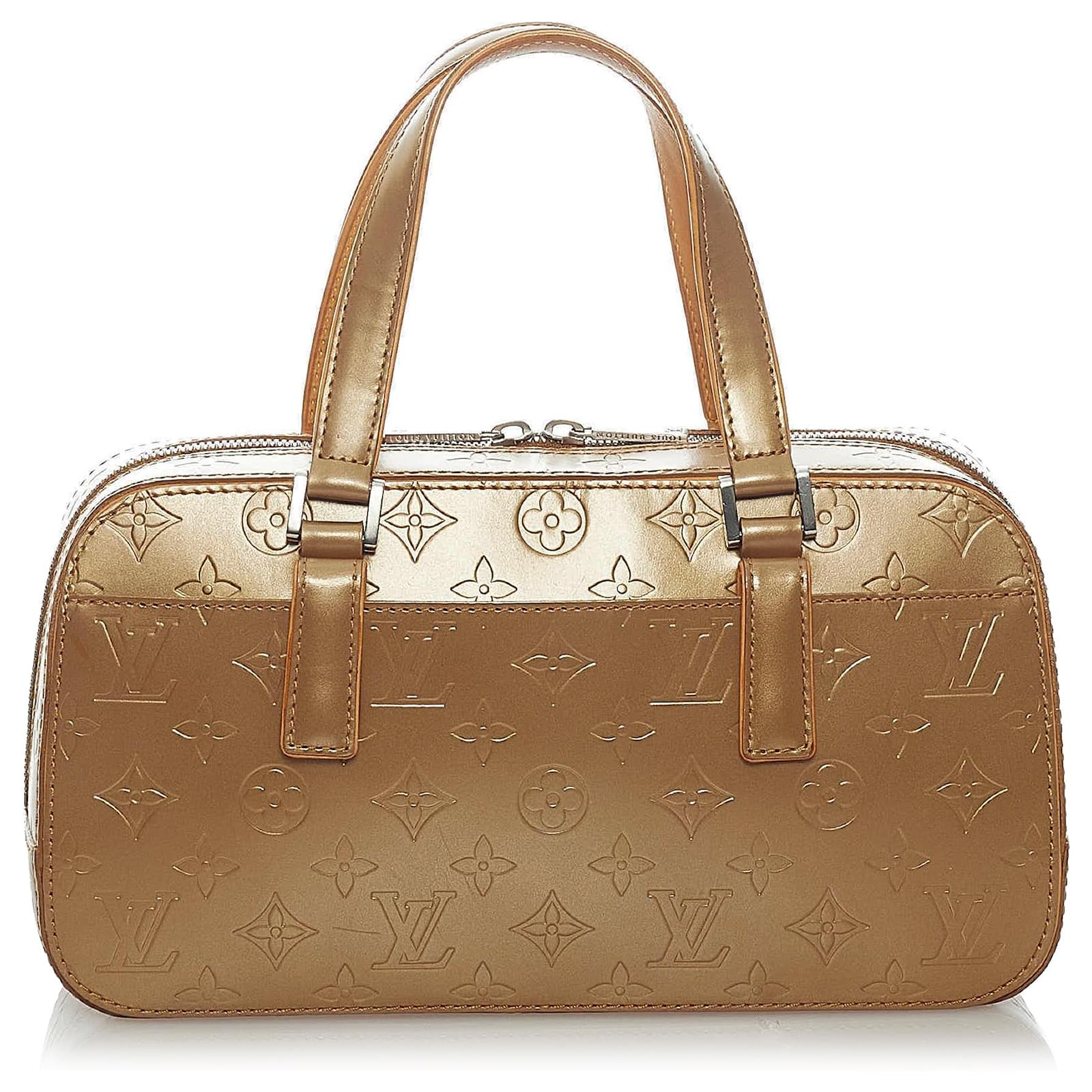 Louis Vuitton Gold Monogram Mat Shelton Golden Leather Pony-style ...