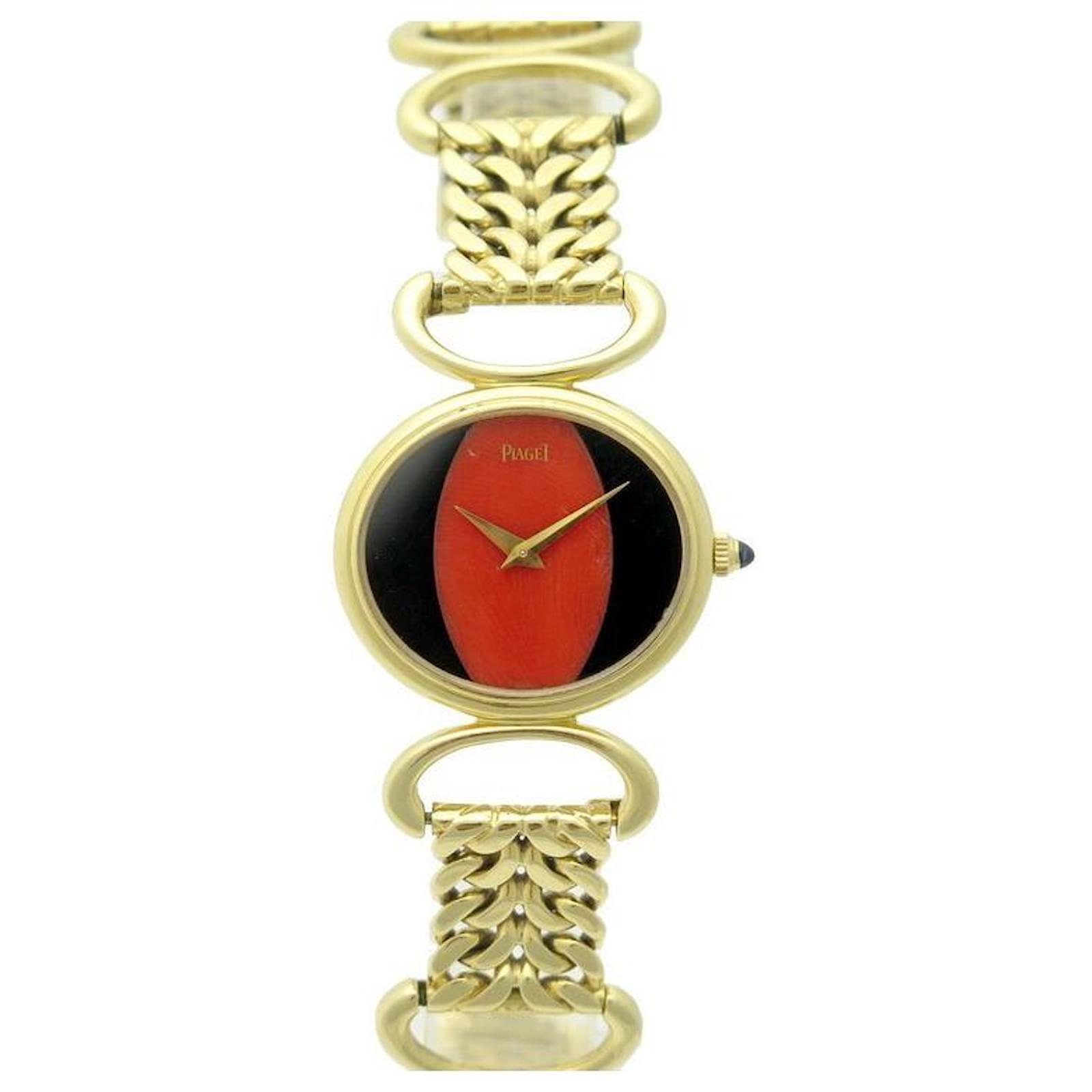 Coral And Gold Watch