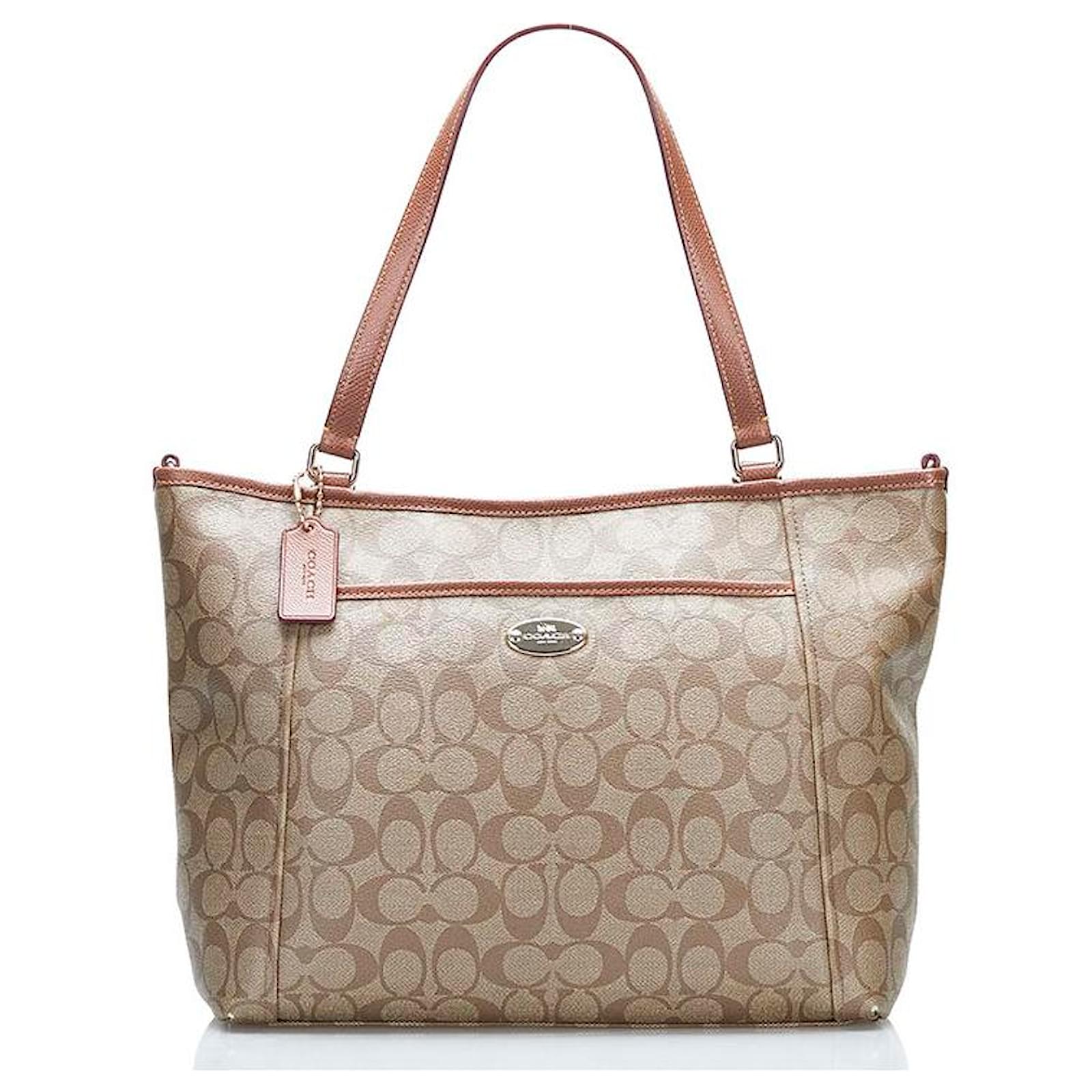 Beige Leather Coach Purse With Front Pocket