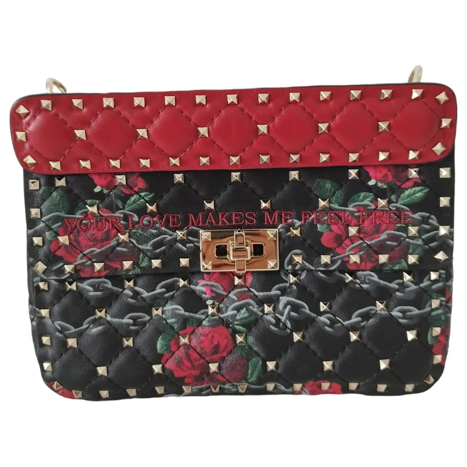 Valentino Garavani Valentino Rockstud Spike bag in black and red ...