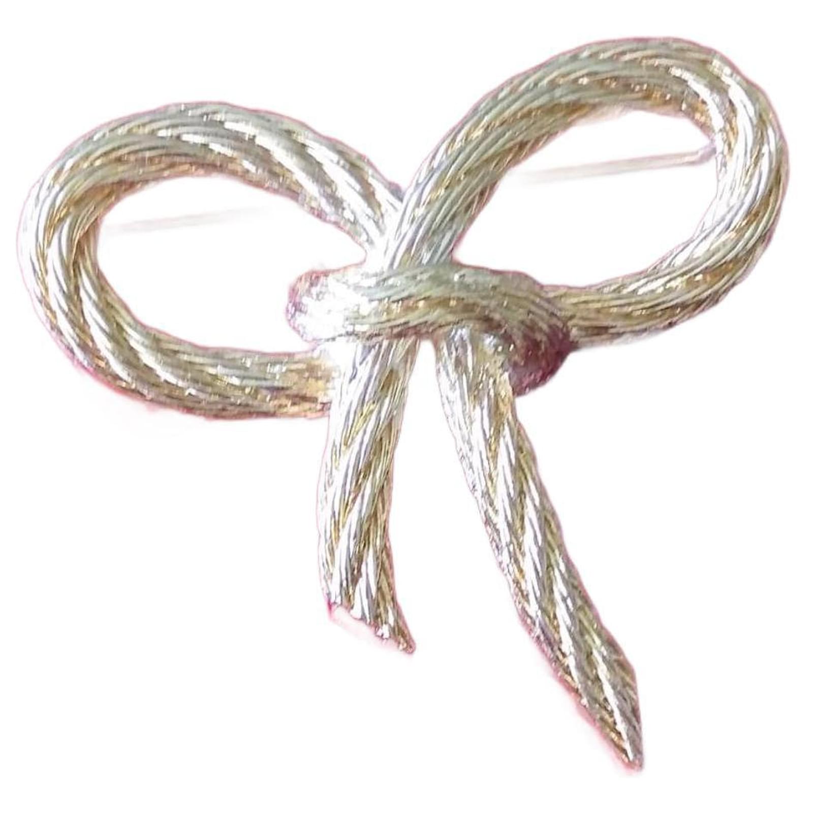 Christian Dior Vintage & New - Ch Node brooch. DIOR - iconic Golden ...