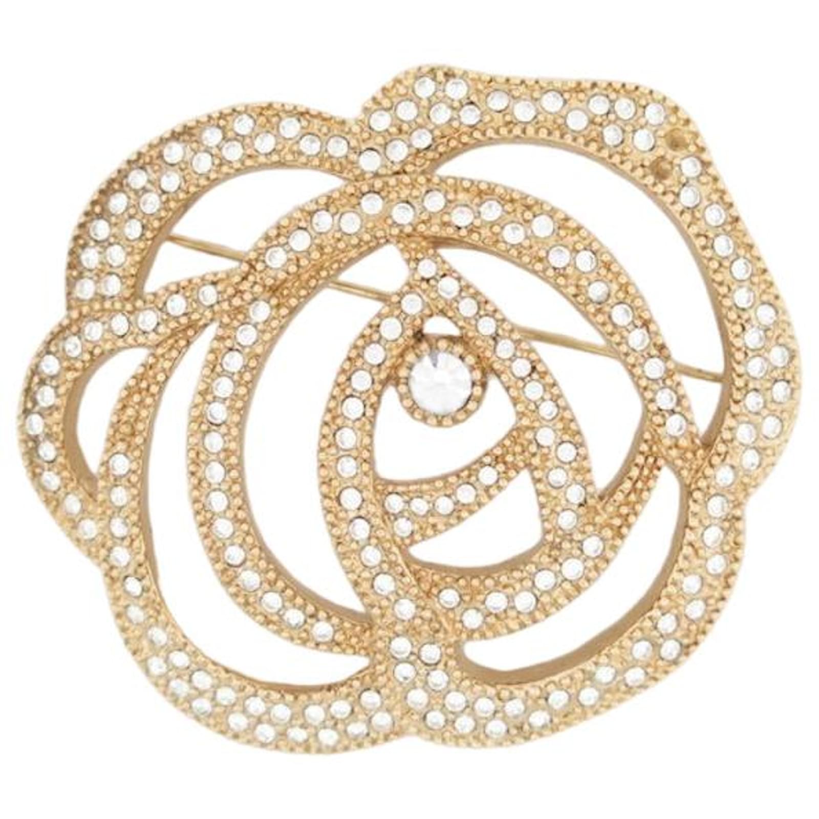 Other jewelry VINTAGE CHRISTIAN DIOR FLOWER AND STRASS BROOCH IN GOLD ...