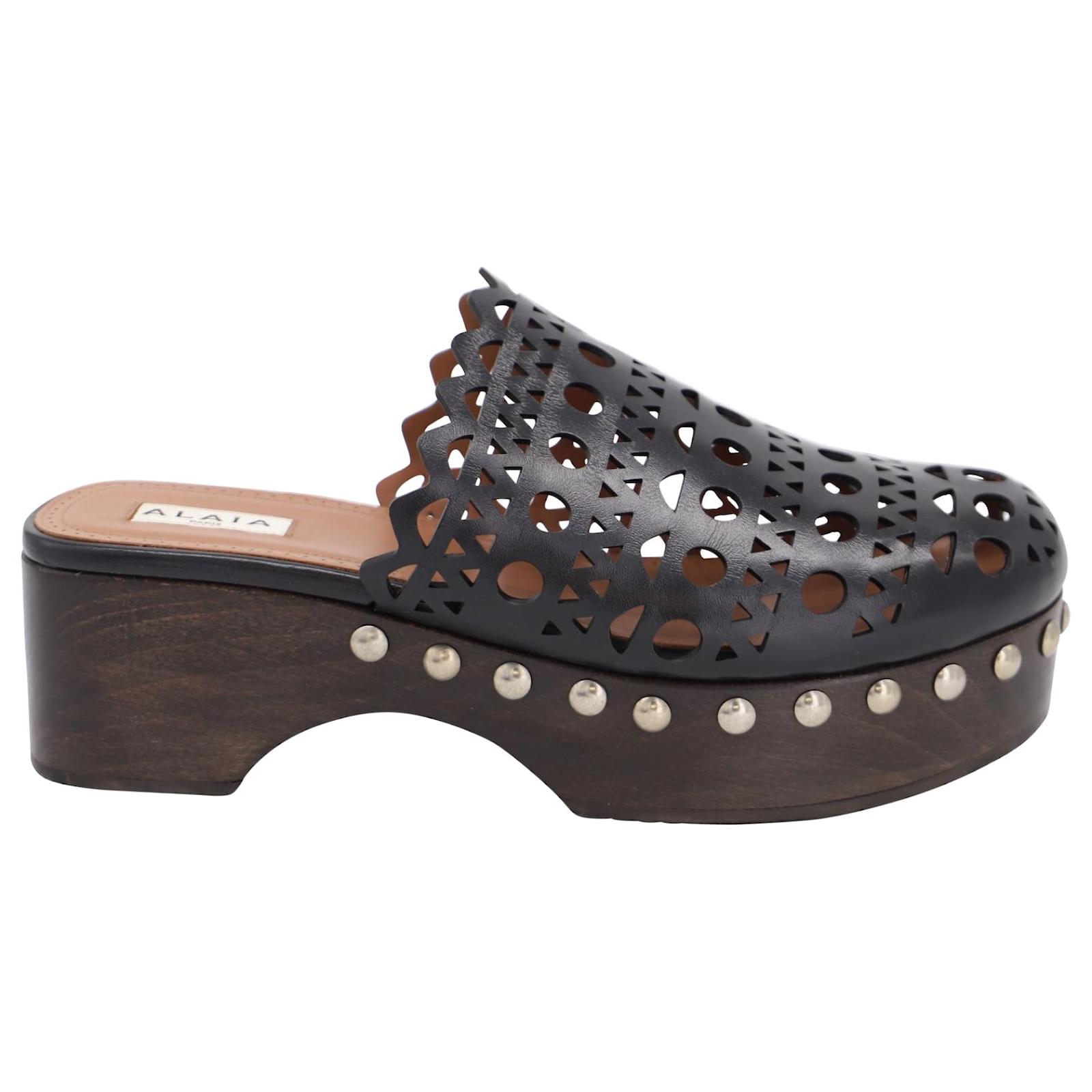 Alaïa Alaia Vienne Laser-Cut Studded Clogs in Black Leather ref.898693 ...