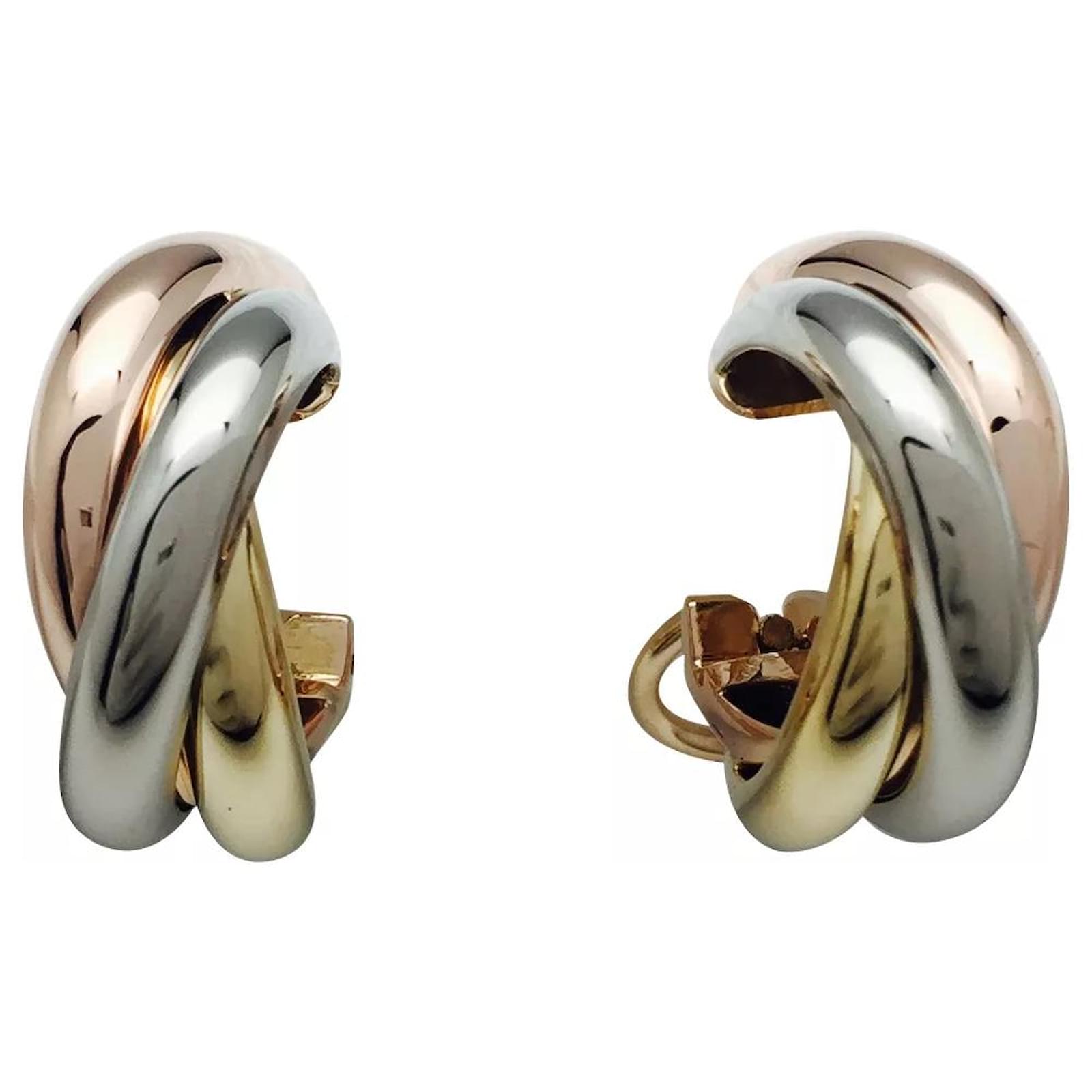 Cartier hoops, "Trinity", three golds. White gold Yellow gold Pink gold ...