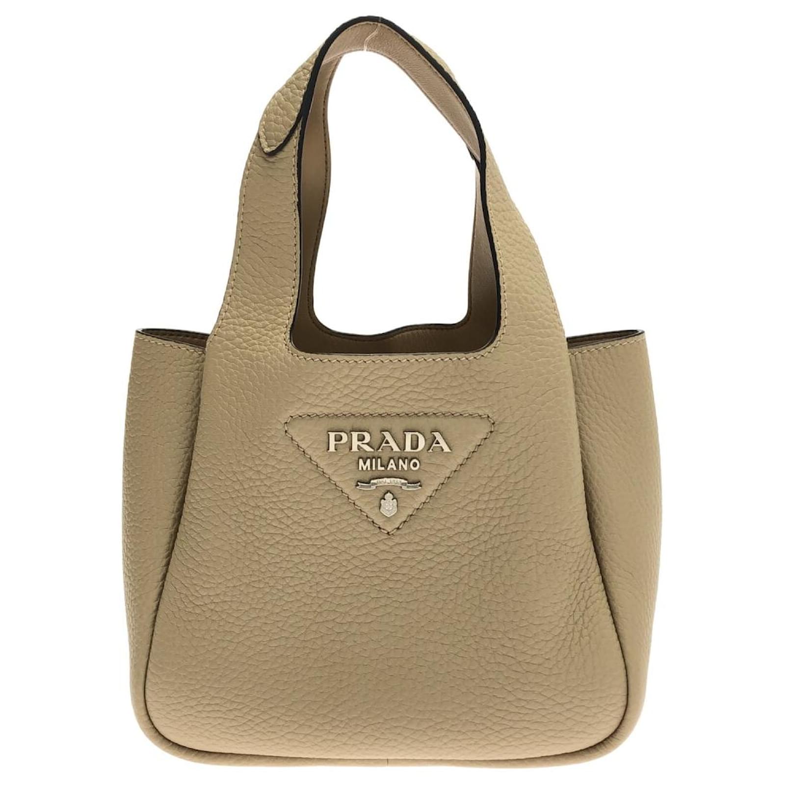 Prada -- Beige Leather ref.1079551 - Joli Closet