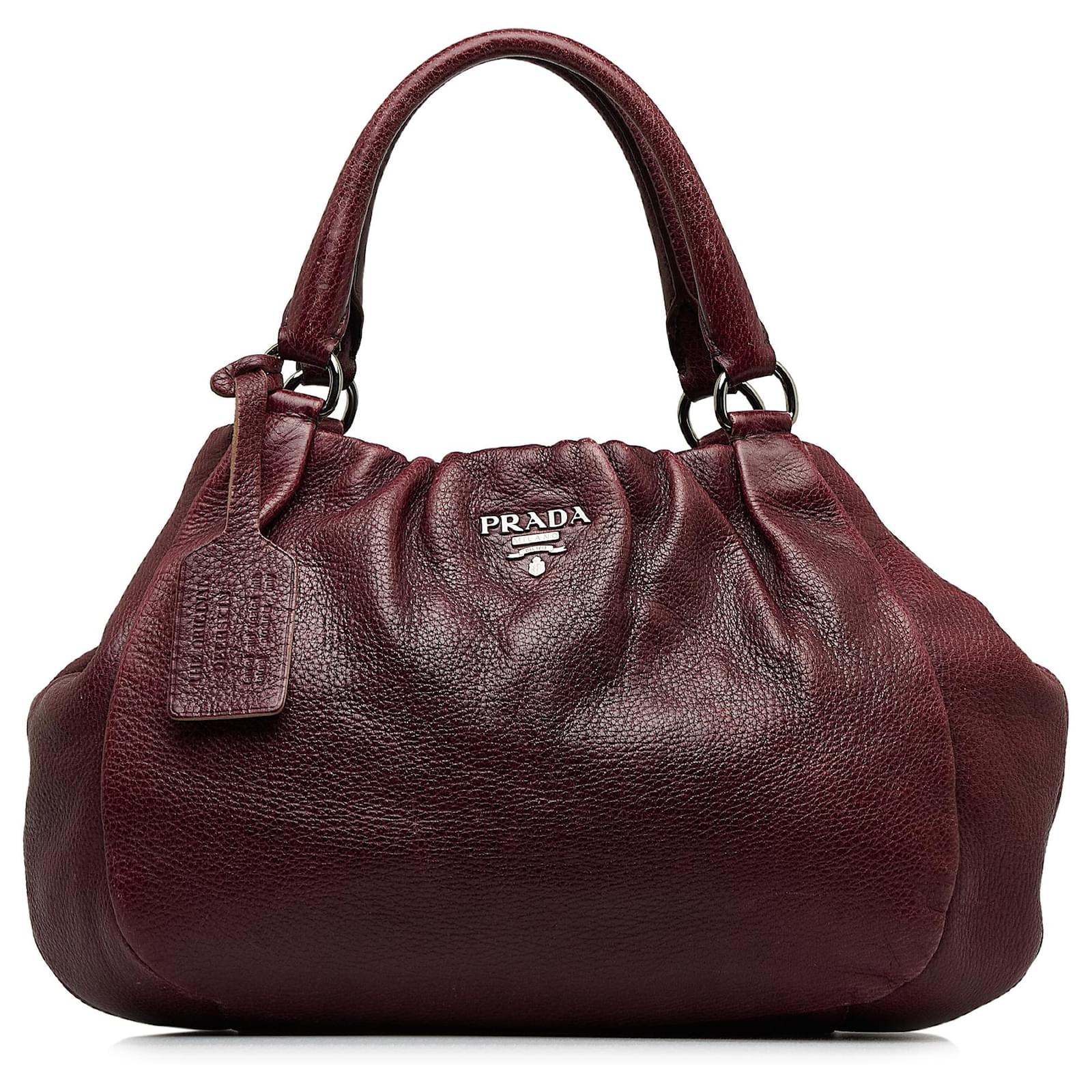 Prada Red Vitello Daino Handbag Dark red Leather Pony-style calfskin ...