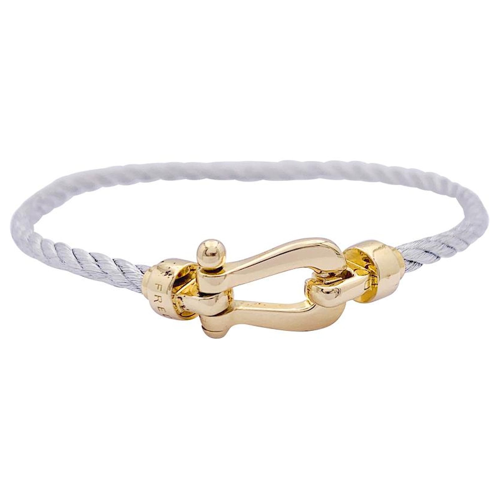Fred Bracelet, "Strength 10", yellow gold and steel. White gold ref ...