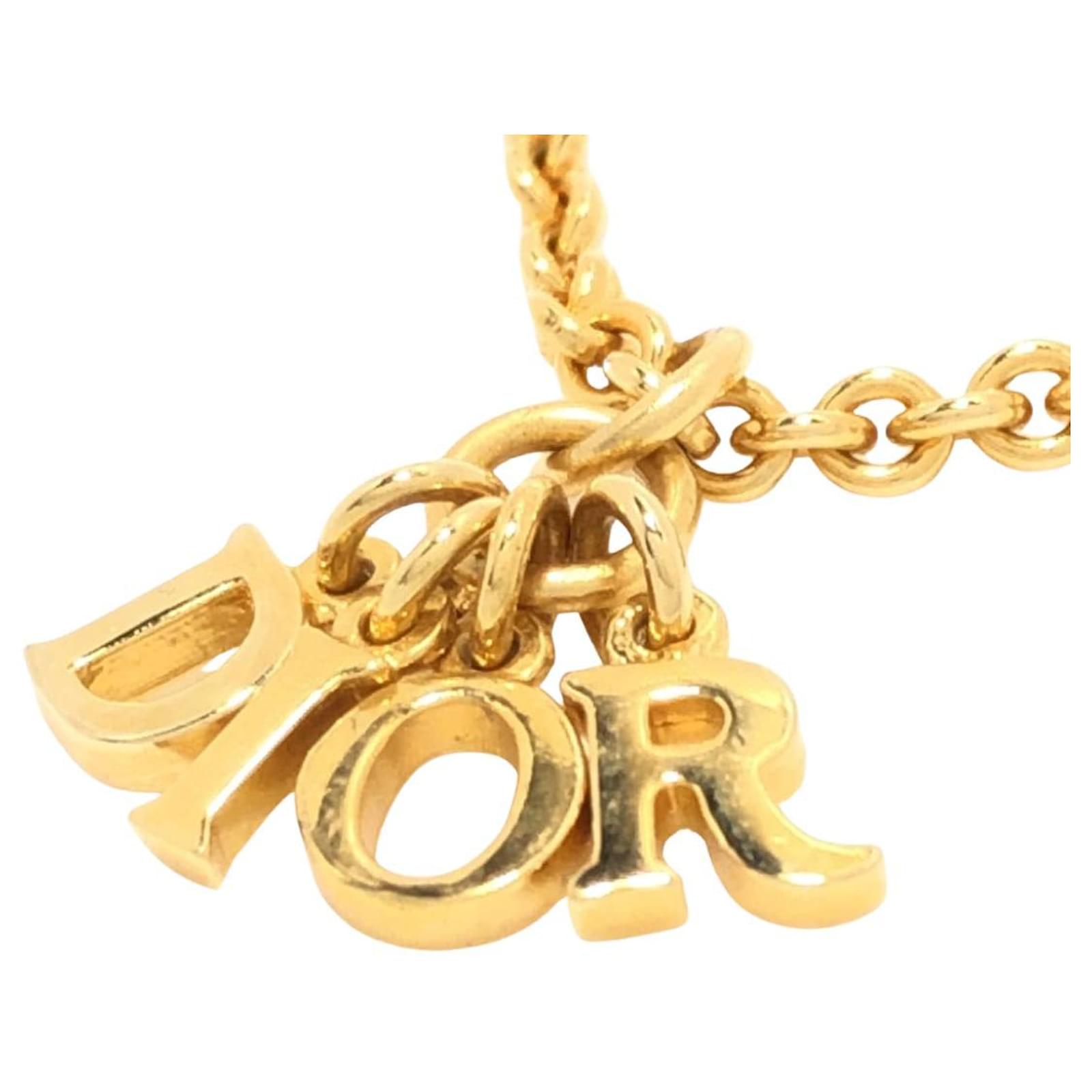 Dior logo Golden Metal ref.1110408 - Joli Closet